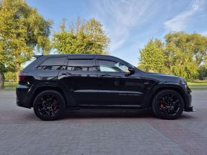 Black Jeep Grand Cherokee 2012 in Silute, with an engine capacity of 6.40 L and mileage of 245 thousand km for 15999 €, photo 3 on AUTOMOTO.COM.LV