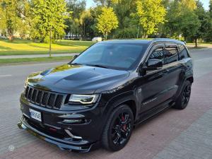 Black Jeep Grand Cherokee 2012 in Silute, with an engine capacity of 6.40 L and mileage of 245 thousand km for 15999 €, photo 5 on AUTOMOTO.COM.LV