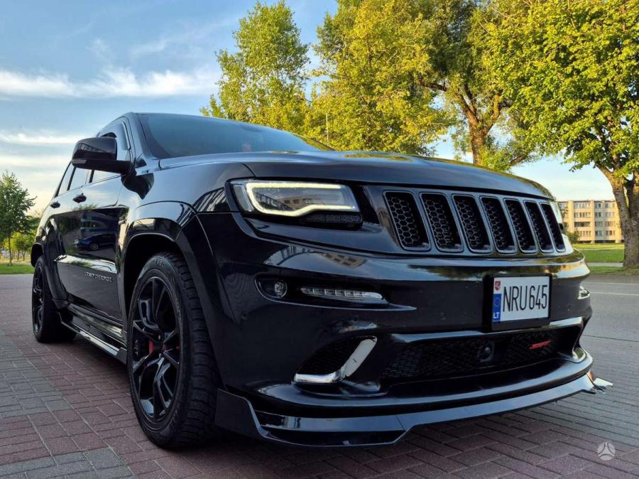 Black Jeep Grand Cherokee 2012 in Silute, with an engine capacity of 6.40 L and mileage of 245 thousand km for 15999 €, photo 8 on AUTOMOTO.COM.LV