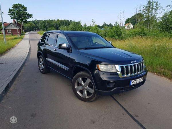 Melns Jeep Grand Cherokee 2012 Viļņa, ar dzinēja tilpumu 5.70 L un nobraukumu 226 tūkst. km par 5999 €, foto 1 vietnē AUTOMOTO.COM.LV