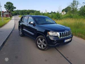 Black Jeep Grand Cherokee 2012 in Vilnius, with an engine capacity of 5.70 L and mileage of 226 thousand km for 5999 €, photo  on AUTOMOTO.COM.LV