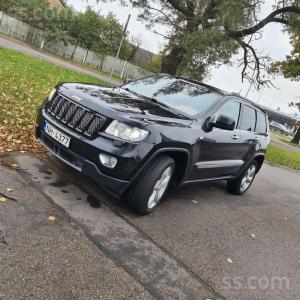 Melns Jeep Grand Cherokee 2012 Rīga, ar dzinēja tilpumu 3.00 L un nobraukumu 276 tūkst. km par 10500 €, foto  vietnē AUTOMOTO.COM.LV