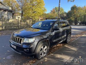 Melns Jeep Grand Cherokee 2012 Rīga, ar dzinēja tilpumu 3.00 L un nobraukumu 301 tūkst. km par 7700 €, foto  vietnē AUTOMOTO.COM.LV