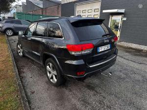 Black Jeep Grand Cherokee 2013 in Kaunas, with an engine capacity of 2.99 L and mileage of 218 thousand km for 6750 €, photo 7 on AUTOMOTO.COM.LV