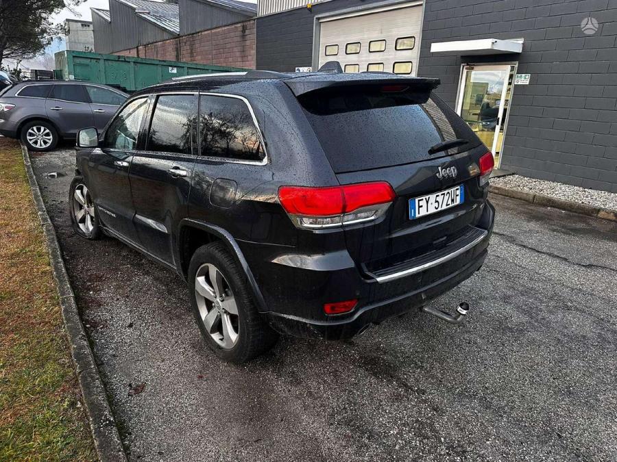 Black Jeep Grand Cherokee 2013 in Kaunas, with an engine capacity of 2.99 L and mileage of 218 thousand km for 6750 €, photo 7 on AUTOMOTO.COM.LV