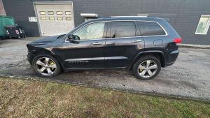 Black Jeep Grand Cherokee 2013 in Kaunas, with an engine capacity of 2.99 L and mileage of 218 thousand km for 6750 €, photo 11 on AUTOMOTO.COM.LV
