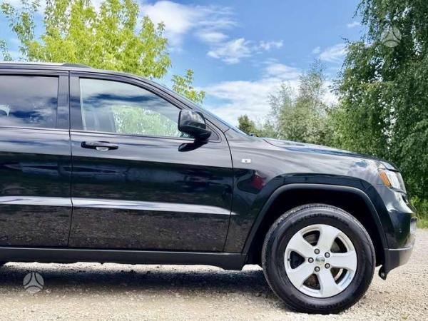 Black Jeep Grand Cherokee 2013 in Siauliai, with an engine capacity of 2.99 L and mileage of 284 thousand km for 13200 €, photo 10 on AUTOMOTO.COM.LV