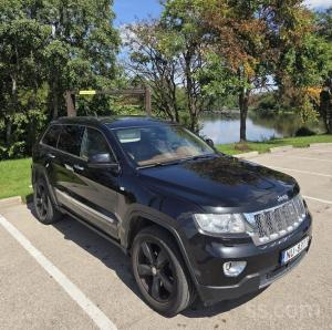 Melns Jeep Grand Cherokee 2013 Rīga, ar dzinēja tilpumu 3.00 L un nobraukumu 234 tūkst. km par 11300 €, foto  vietnē AUTOMOTO.COM.LV