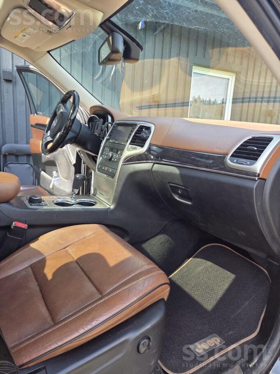 Melns Jeep Grand Cherokee 2013 Rīga, ar dzinēja tilpumu 3.00 L un nobraukumu 234 tūkst. km par 11300 €, foto 13 vietnē AUTOMOTO.COM.LV