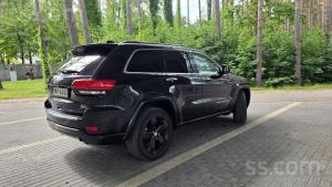 Black Jeep Grand Cherokee 2013 in Jurmala, with an engine capacity of 3.00 L and mileage of 342 thousand km for 14000 €, photo 4 on AUTOMOTO.COM.LV