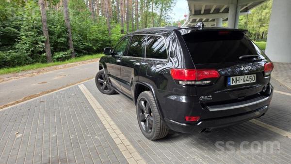 Black Jeep Grand Cherokee 2013 in Jurmala, with an engine capacity of 3.00 L and mileage of 342 thousand km for 14000 €, photo 5 on AUTOMOTO.COM.LV