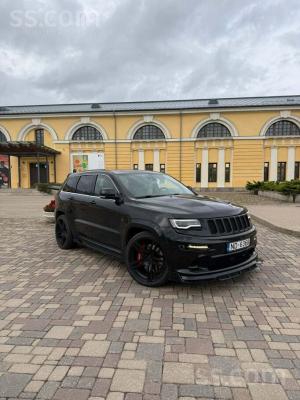 Black Jeep Grand Cherokee 2013 in Daugavpils, with an engine capacity of 6.40 L and mileage of 235 thousand km for 26500 €, photo 3 on AUTOMOTO.COM.LV