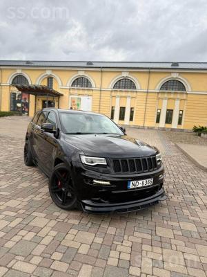 Black Jeep Grand Cherokee 2013 in Daugavpils, with an engine capacity of 6.40 L and mileage of 235 thousand km for 26500 €, photo 4 on AUTOMOTO.COM.LV