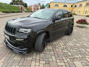 Black Jeep Grand Cherokee 2013 in Daugavpils, with an engine capacity of 6.40 L and mileage of 235 thousand km for 26500 €, photo 13 on AUTOMOTO.COM.LV