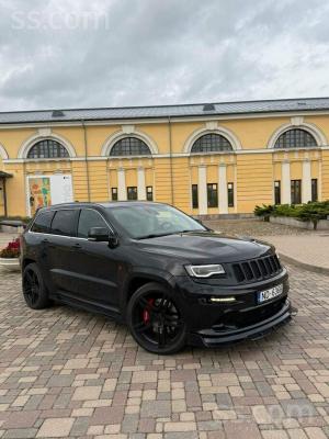 Black Jeep Grand Cherokee 2013 in Daugavpils, with an engine capacity of 6.40 L and mileage of 235 thousand km for 26500 €, photo 14 on AUTOMOTO.COM.LV