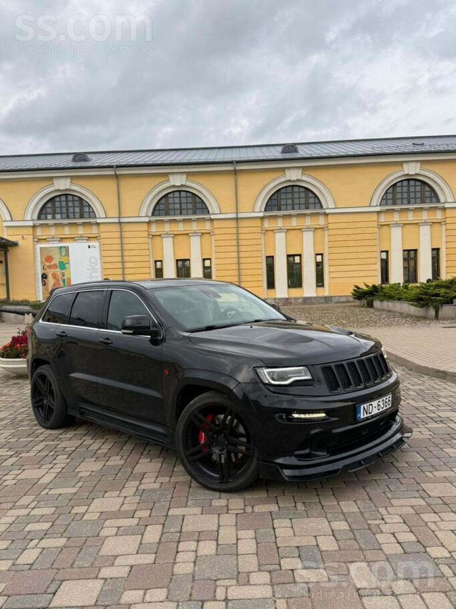 Black Jeep Grand Cherokee 2013 in Daugavpils, with an engine capacity of 6.40 L and mileage of 235 thousand km for 26500 €, photo 14 on AUTOMOTO.COM.LV