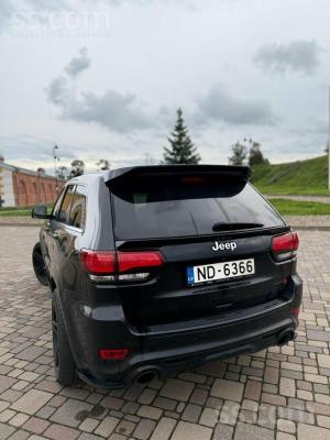 Black Jeep Grand Cherokee 2013 in Daugavpils, with an engine capacity of 6.40 L and mileage of 235 thousand km for 26500 €, photo 19 on AUTOMOTO.COM.LV
