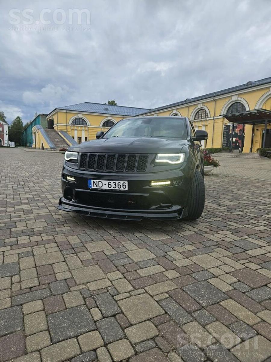 Black Jeep Grand Cherokee 2013 in Daugavpils, with an engine capacity of 6.40 L and mileage of 235 thousand km for 26500 €, photo 20 on AUTOMOTO.COM.LV
