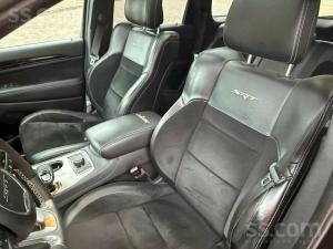 Black Jeep Grand Cherokee 2013 in Daugavpils, with an engine capacity of 6.40 L and mileage of 235 thousand km for 26500 €, photo 21 on AUTOMOTO.COM.LV