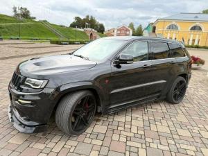 Black Jeep Grand Cherokee 2013 in Daugavpils, with an engine capacity of 6.40 L and mileage of 235 thousand km for 26500 €, photo 22 on AUTOMOTO.COM.LV