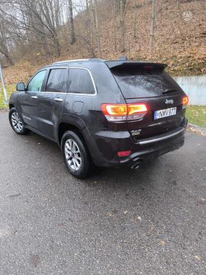 Black Jeep Grand Cherokee 2014 in Vilnius, with an engine capacity of 3.60 L and mileage of 250 thousand km for 14700 €, photo 4 on AUTOMOTO.COM.LV