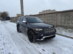 Black Jeep Grand Cherokee 2014 in Kaunas, with an engine capacity of 5.65 L and mileage of 236 thousand km for 16700 €, photo 2 on AUTOMOTO.COM.LV