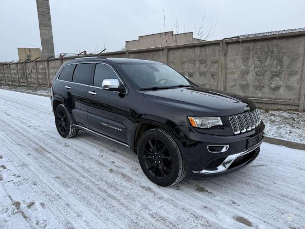 Black Jeep Grand Cherokee 2014 in Kaunas, with an engine capacity of 5.65 L and mileage of 236 thousand km for 16700 €, photo 3 on AUTOMOTO.COM.LV