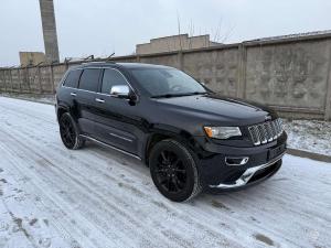 Black Jeep Grand Cherokee 2014 in Kaunas, with an engine capacity of 5.65 L and mileage of 236 thousand km for 16700 €, photo 3 on AUTOMOTO.COM.LV