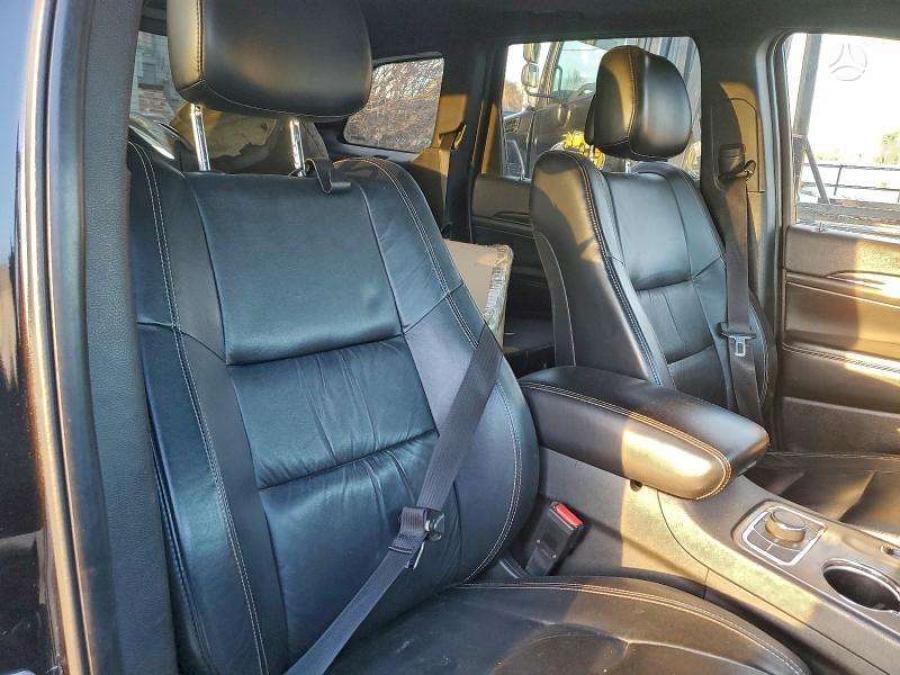 Black Jeep Grand Cherokee 2014 in Siauliai, with an engine capacity of 3.60 L and mileage of 167 thousand km for 5100 €, photo 11 on AUTOMOTO.COM.LV