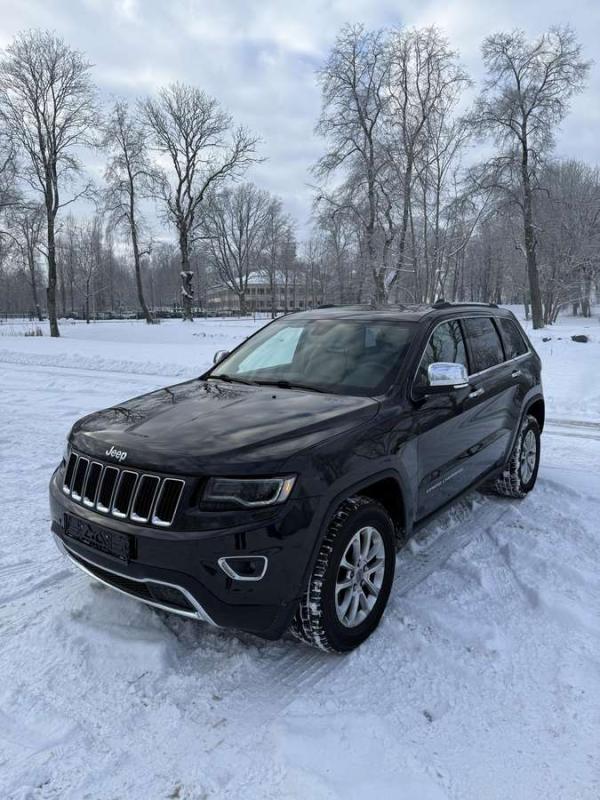 Black Jeep Grand Cherokee 2014 in Siauliai, with an engine capacity of 3.60 L and mileage of 148 thousand km for 13999 €, photo 4 on AUTOMOTO.COM.LV