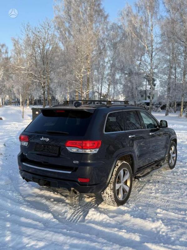 Black Jeep Grand Cherokee 2014 in Siauliai, with an engine capacity of 3.60 L and mileage of 235 thousand km for 14499 €, photo 2 on AUTOMOTO.COM.LV