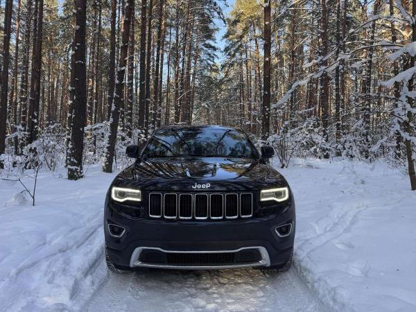 Black Jeep Grand Cherokee 2014 in Moletai, with an engine capacity of 2.99 L and mileage of 208 thousand km for 13500 €, photo 2 on AUTOMOTO.COM.LV