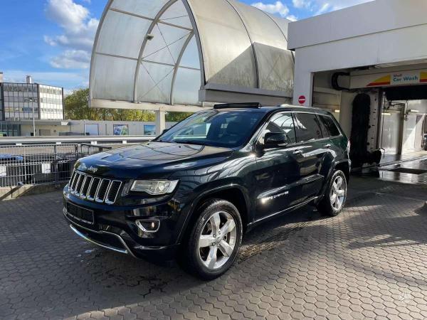 Black Jeep Grand Cherokee 2014 in Kaunas, with an engine capacity of 3.00 L and mileage of 168 thousand km for 13200 €, photo 2 on AUTOMOTO.COM.LV