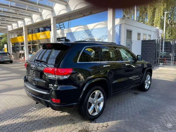 Black Jeep Grand Cherokee 2014 in Kaunas, with an engine capacity of 3.00 L and mileage of 168 thousand km for 13200 €, photo 3 on AUTOMOTO.COM.LV