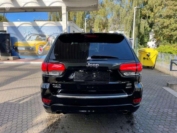 Black Jeep Grand Cherokee 2014 in Kaunas, with an engine capacity of 3.00 L and mileage of 168 thousand km for 13200 €, photo 4 on AUTOMOTO.COM.LV