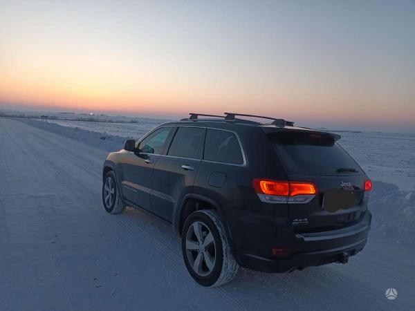 Black Jeep Grand Cherokee 2014 in Taurage, with an engine capacity of 2.99 L and mileage of 201 thousand km for 11200 €, photo 6 on AUTOMOTO.COM.LV