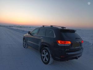 Black Jeep Grand Cherokee 2014 in Taurage, with an engine capacity of 2.99 L and mileage of 209 thousand km for 11200 €, photo 4 on AUTOMOTO.COM.LV