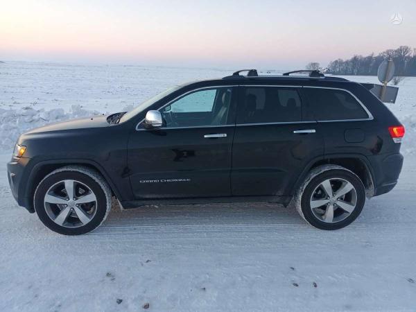 Black Jeep Grand Cherokee 2014 in Taurage, with an engine capacity of 2.99 L and mileage of 209 thousand km for 11200 €, photo 6 on AUTOMOTO.COM.LV
