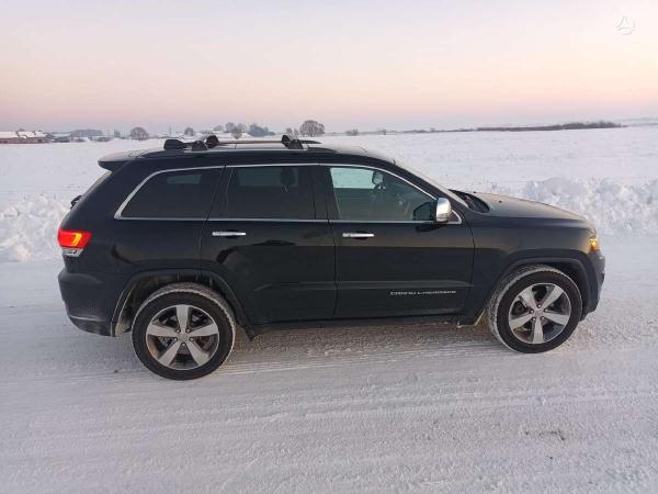 Black Jeep Grand Cherokee 2014 in Taurage, with an engine capacity of 2.99 L and mileage of 209 thousand km for 11200 €, photo 7 on AUTOMOTO.COM.LV