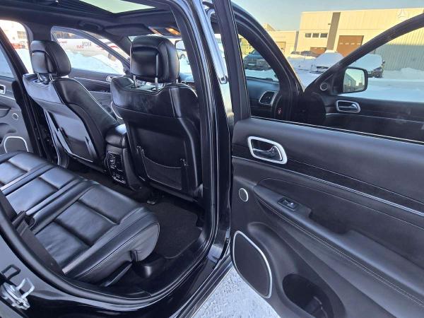 Black Jeep Grand Cherokee 2014 in Jonava, with an engine capacity of 2.99 L and mileage of 2466 thousand km for 14190 €, photo 11 on AUTOMOTO.COM.LV