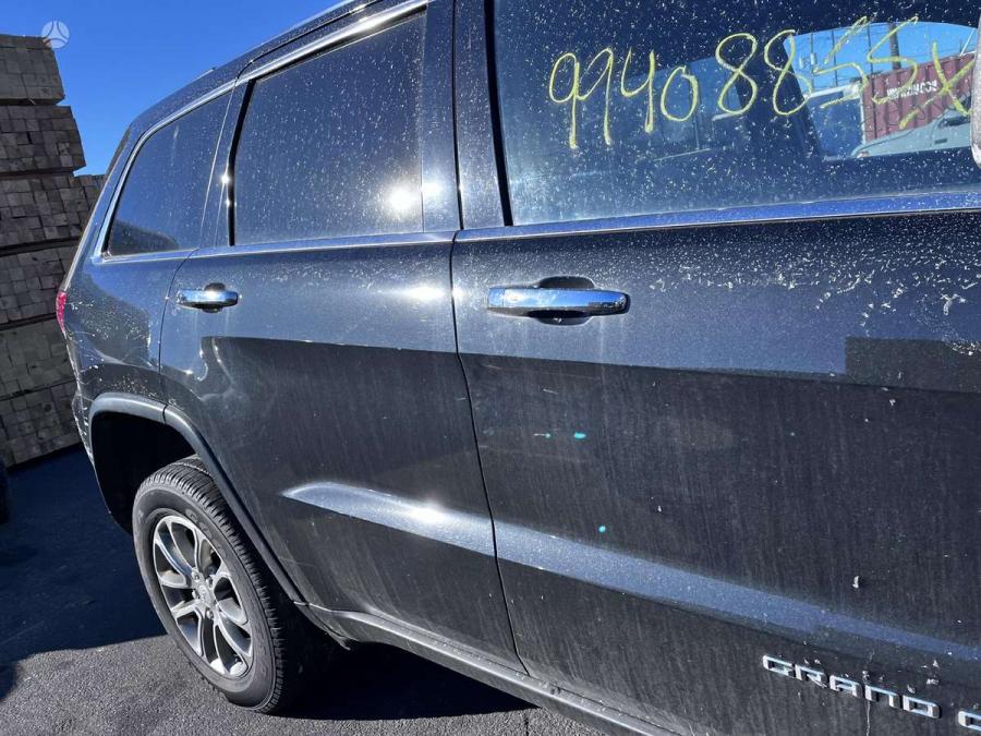 Black Jeep Grand Cherokee 2014 in Siauliai, with an engine capacity of 3.60 L and mileage of 250 thousand km for 7260 €, photo 5 on AUTOMOTO.COM.LV