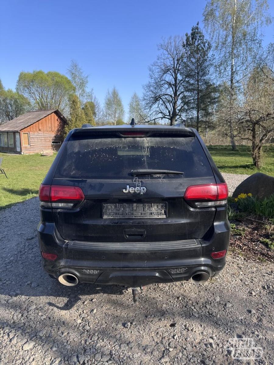Black Jeep Grand Cherokee 2014 in Vilnius, with an engine capacity of 5.70 L and mileage of 293 thousand km for 11299 €, photo 3 on AUTOMOTO.COM.LV