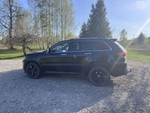 Black Jeep Grand Cherokee 2014 in Vilnius, with an engine capacity of 5.70 L and mileage of 293 thousand km for 11299 €, photo 5 on AUTOMOTO.COM.LV