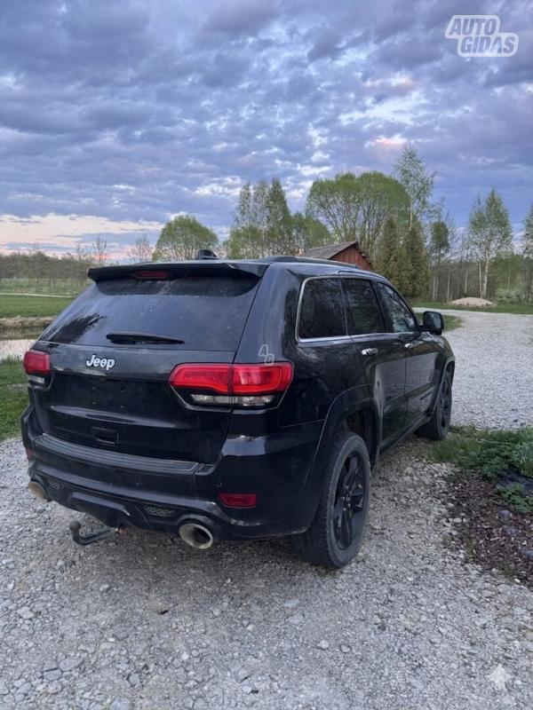 Melns Jeep Grand Cherokee 2014 Viļņa, ar dzinēja tilpumu 5.70 L un nobraukumu 293 tūkst. km par 9999 €, foto 1 vietnē AUTOMOTO.COM.LV