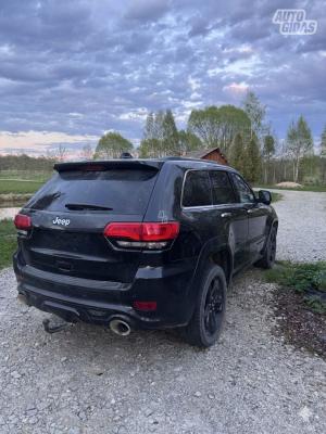 Melns Jeep Grand Cherokee 2014 Viļņa, ar dzinēja tilpumu 5.70 L un nobraukumu 293 tūkst. km par 9999 €, foto  vietnē AUTOMOTO.COM.LV