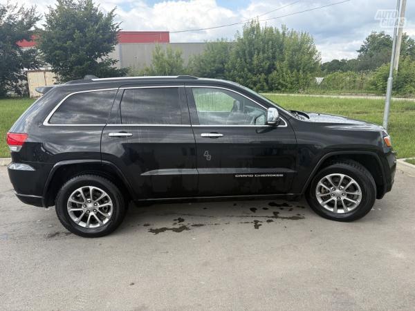 Melns Jeep Grand Cherokee 2014 Panevēža, ar dzinēja tilpumu 3.00 L un nobraukumu 300 tūkst. km par 9500 €, foto 6 vietnē AUTOMOTO.COM.LV