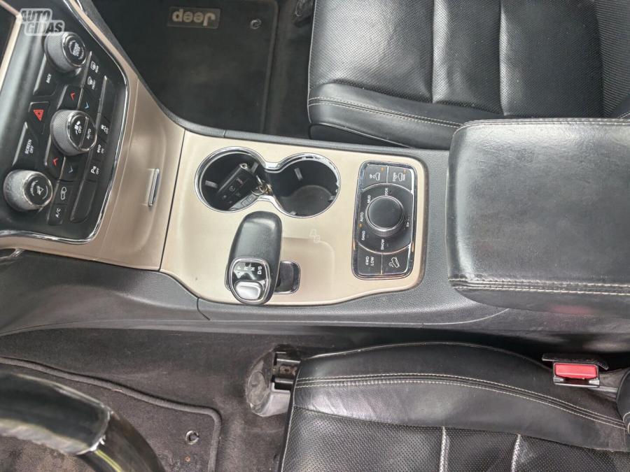 Melns Jeep Grand Cherokee 2014 Panevēža, ar dzinēja tilpumu 3.00 L un nobraukumu 300 tūkst. km par 9500 €, foto 13 vietnē AUTOMOTO.COM.LV