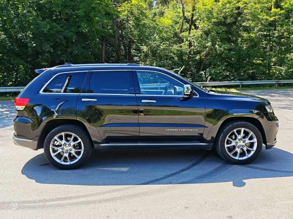 Melns Jeep Grand Cherokee 2014 Kauņa, ar dzinēja tilpumu 5.65 L un nobraukumu 238 tūkst. km par 13500 €, foto 4 vietnē AUTOMOTO.COM.LV