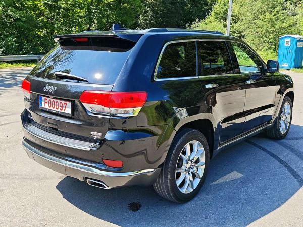 Melns Jeep Grand Cherokee 2014 Kauņa, ar dzinēja tilpumu 5.65 L un nobraukumu 238 tūkst. km par 13500 €, foto 5 vietnē AUTOMOTO.COM.LV