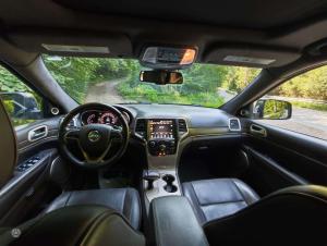 Black Jeep Grand Cherokee 2014 in Kaunas, with an engine capacity of 5.65 L and mileage of 238 thousand km for 13500 €, photo 26 on AUTOMOTO.COM.LV
